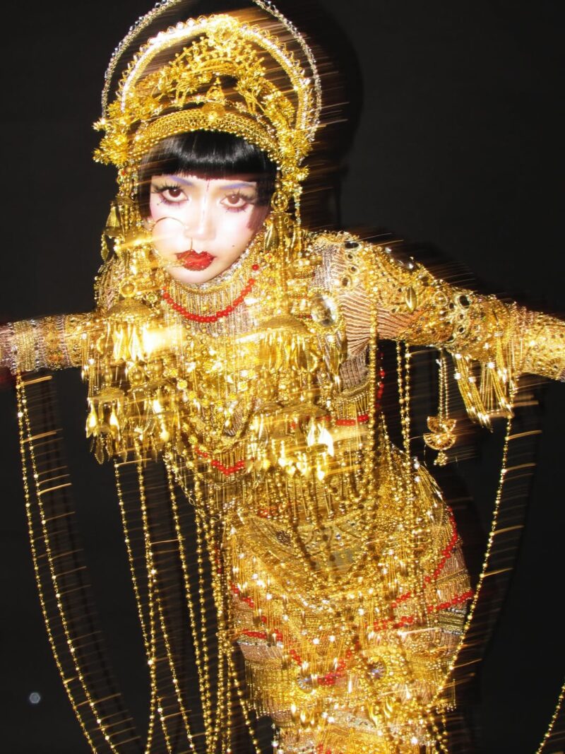 BLACKPINK's LISA Dazzles in Golden Jibaro Halloween Costume